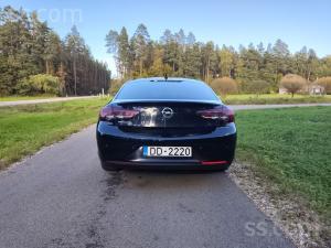 Blue Opel Insignia 2019 in Riga, with an engine capacity of 2.00 L and mileage of 184 thousand km for 10500 €, photo 7 on AUTOMOTO.COM.LV