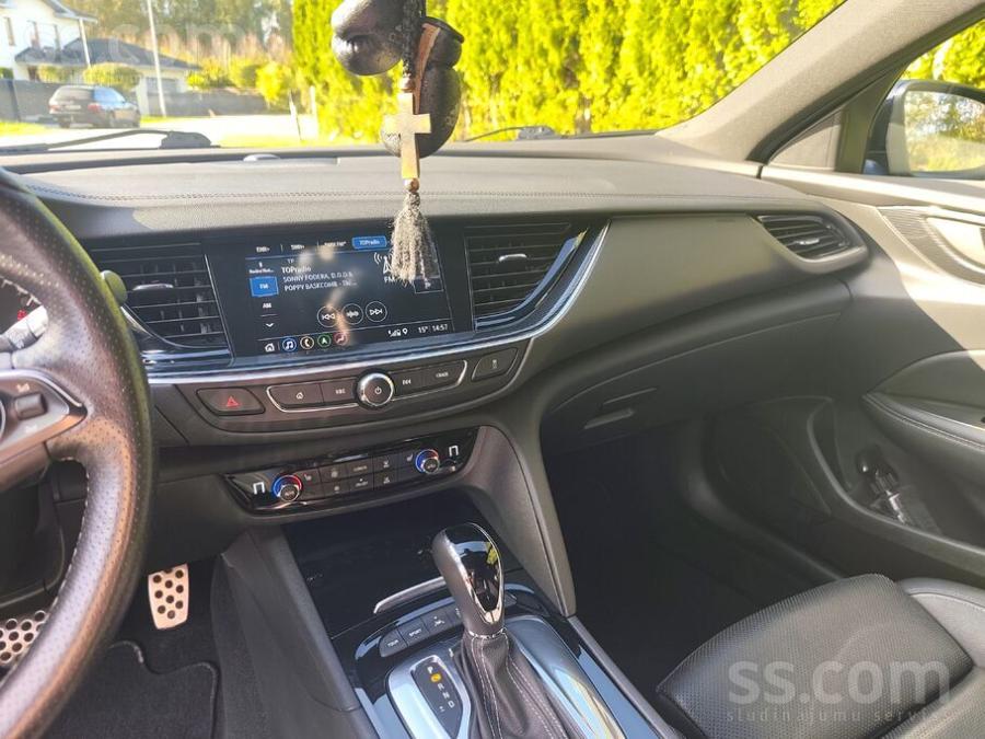 Blue Opel Insignia 2019 in Riga, with an engine capacity of 2.00 L and mileage of 184 thousand km for 10500 €, photo 12 on AUTOMOTO.COM.LV