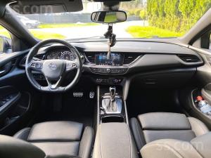 Blue Opel Insignia 2019 in Riga, with an engine capacity of 2.00 L and mileage of 184 thousand km for 10500 €, photo 13 on AUTOMOTO.COM.LV