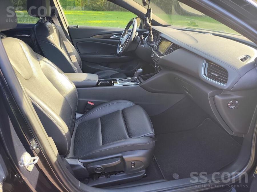 Blue Opel Insignia 2019 in Riga, with an engine capacity of 2.00 L and mileage of 184 thousand km for 10500 €, photo 15 on AUTOMOTO.COM.LV