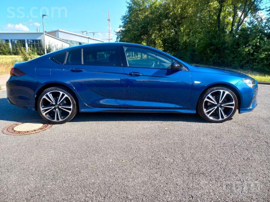 Blue Opel Insignia 2021 in Riga, with an engine capacity of 1.50 L and mileage of 139 thousand km for 10900 €, photo 4 on AUTOMOTO.COM.LV