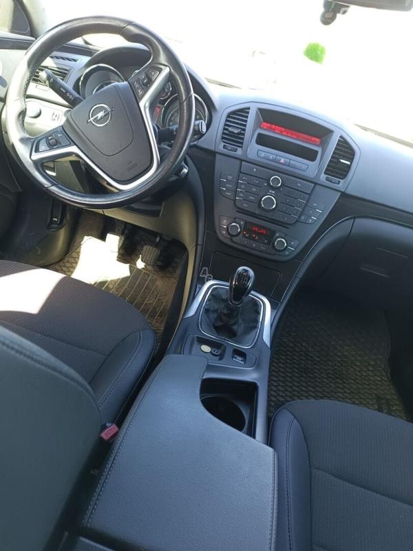 Blue Opel Insignia 2009 in Klaipeda, with an engine capacity of 2.00 L and mileage of 31 thousand km for 2200 €, photo 5 on AUTOMOTO.COM.LV