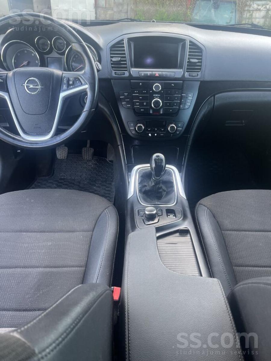 Blue Opel Insignia 2009 in Riga, with an engine capacity of 2.00 L and mileage of 228 thousand km for 1700 €, photo 9 on AUTOMOTO.COM.LV