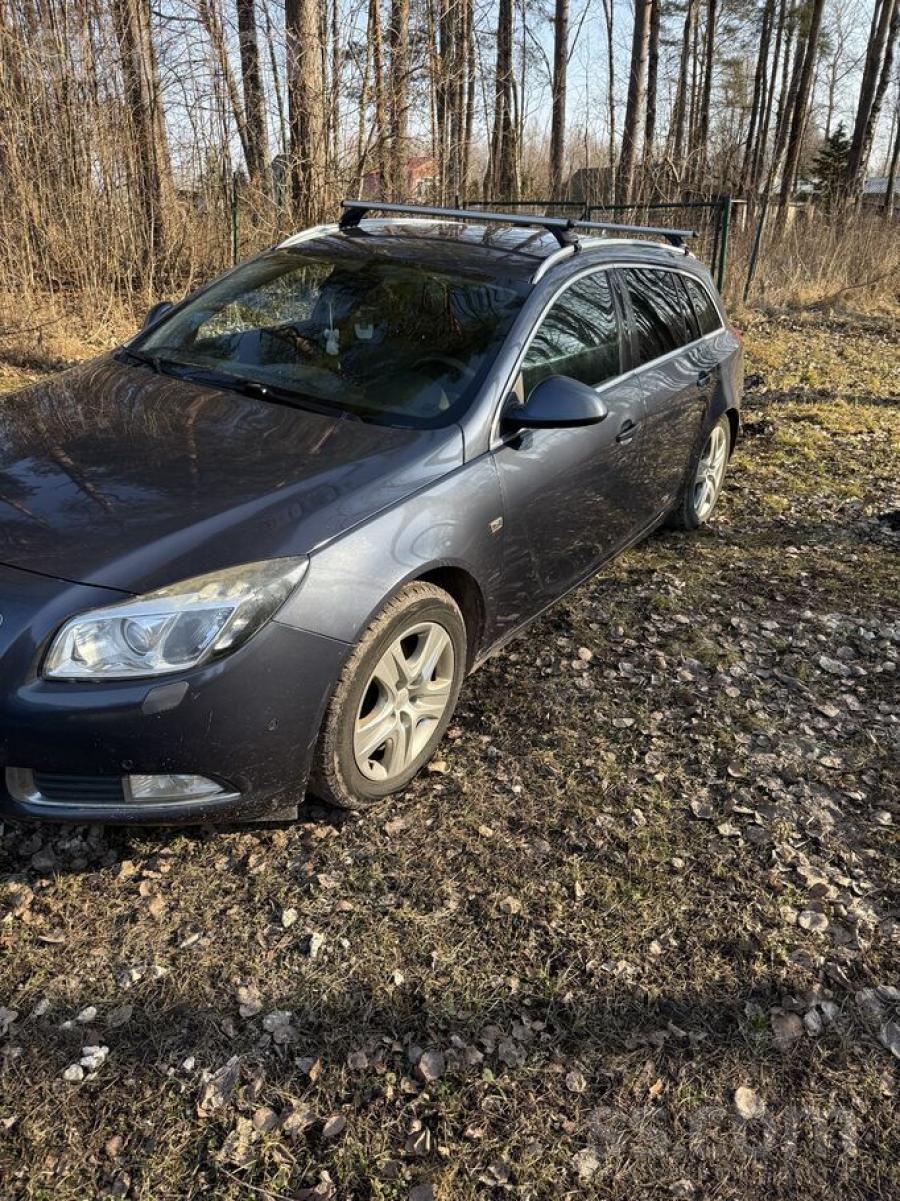 Blue Opel Insignia 2010 in Riga, with an engine capacity of 2.00 L and mileage of 341 thousand km for 3000 €, photo 2 on AUTOMOTO.COM.LV