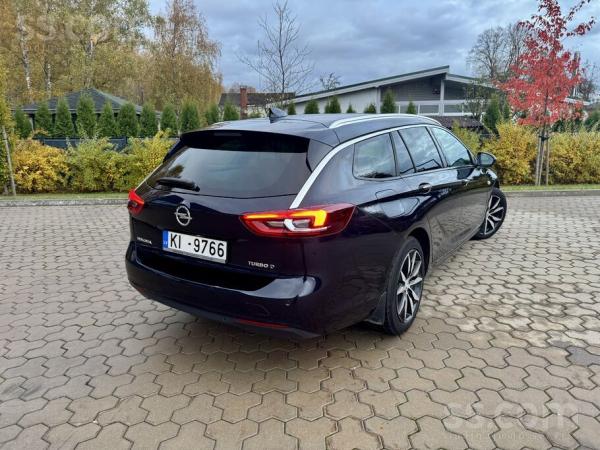Blue Opel Insignia 2018 in Riga, with an engine capacity of 2.00 L and mileage of 176 thousand km for 10700 €, photo 4 on AUTOMOTO.COM.LV