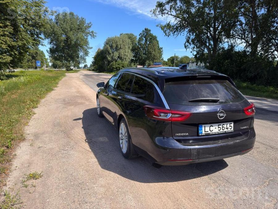 Blue Opel Insignia 2018 in Riga, with an engine capacity of 2.00 L and mileage of 174 thousand km for 7200 €, photo 6 on AUTOMOTO.COM.LV