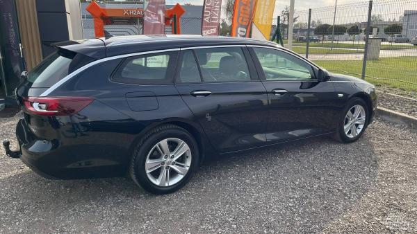 Blue Opel Insignia 2018 in Marijampole, with an engine capacity of 2.00 L and mileage of 280 thousand km for 8990 €, photo 9 on AUTOMOTO.COM.LV