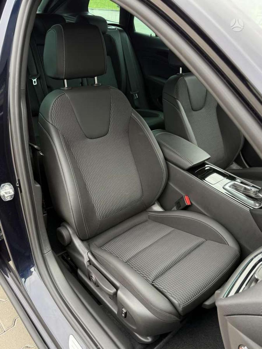 Blue Opel Insignia 2019 in Marijampole, with an engine capacity of 1.96 L and mileage of 138 thousand km for 12600 €, photo 16 on AUTOMOTO.COM.LV