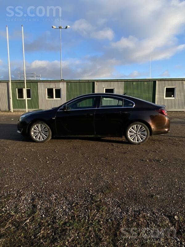 Brown Opel Insignia 2014 in Tukums, with an engine capacity of 2.00 L and mileage of 245 thousand km for 7700 €, photo 4 on AUTOMOTO.COM.LV
