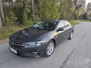 Brown Opel Insignia 2022 in Riga, with an engine capacity of 2.00 L and mileage of 115 thousand km for 15500 €, photo 1 on AUTOMOTO.COM.LV