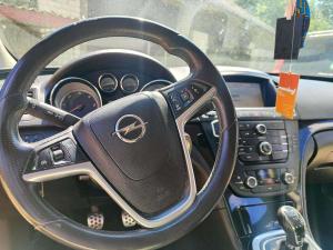 Brown Opel Insignia 2009 in Prienai, with an engine capacity of 1.96 L and mileage of 365 thousand km for 1200 €, photo 11 on AUTOMOTO.COM.LV
