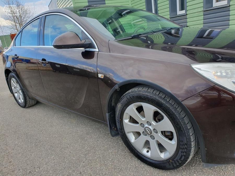 Brown Opel Insignia 2011 in Siauliai, with an engine capacity of 1.80 L and mileage of 290 thousand km for 2400 €, photo 12 on AUTOMOTO.COM.LV