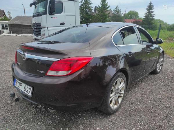 Brown Opel Insignia 2013 in Panevezys, with an engine capacity of 2.00 L and mileage of 314 thousand km for 1500 €, photo 7 on AUTOMOTO.COM.LV