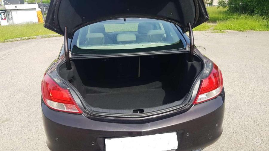 Brown Opel Insignia 2013 in Kaunas, with an engine capacity of 1.96 L and mileage of 241 thousand km for 3500 €, photo 6 on AUTOMOTO.COM.LV