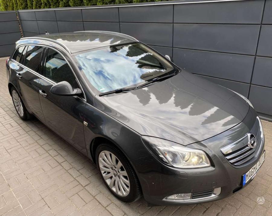 Brown Opel Insignia 2009 in Marijampole, with an engine capacity of 1.96 L and mileage of 278 thousand km for 4350 €, photo 6 on AUTOMOTO.COM.LV