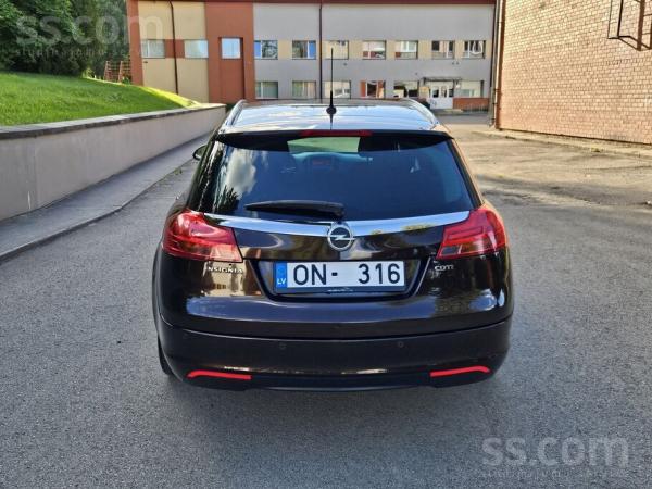 Brown Opel Insignia 2011 in Jekabpils, with an engine capacity of 2.00 L and mileage of 211 thousand km for 5490 €, photo 8 on AUTOMOTO.COM.LV