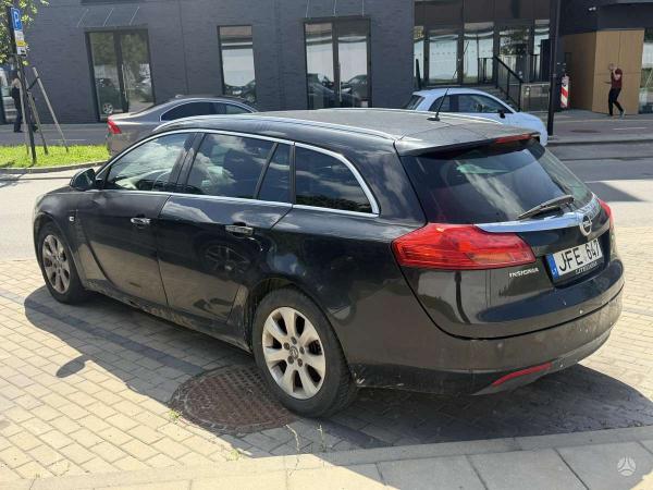 Brown Opel Insignia 2011 in Vilnius, with an engine capacity of 1.96 L and mileage of 300 thousand km for 999 €, photo 5 on AUTOMOTO.COM.LV