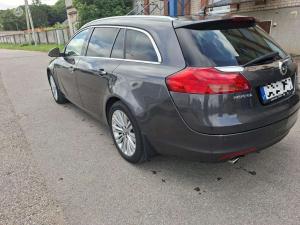 Brown Opel Insignia 2012 in Kaunas, with an engine capacity of 2.00 L and mileage of 183 thousand km for 4250 €, photo 11 on AUTOMOTO.COM.LV