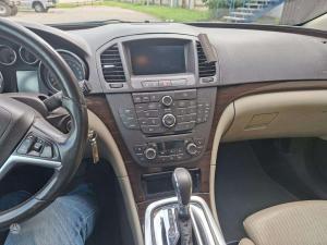 Brown Opel Insignia 2012 in Kaunas, with an engine capacity of 2.00 L and mileage of 183 thousand km for 4250 €, photo 18 on AUTOMOTO.COM.LV