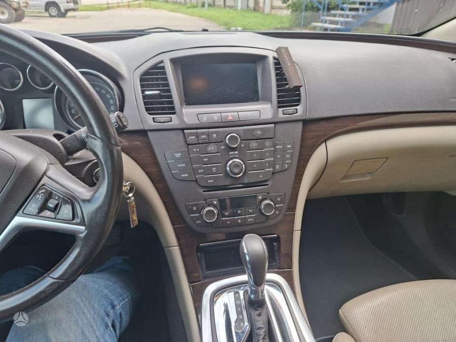 Brown Opel Insignia 2012 in Kaunas, with an engine capacity of 2.00 L and mileage of 183 thousand km for 4250 €, photo 18 on AUTOMOTO.COM.LV