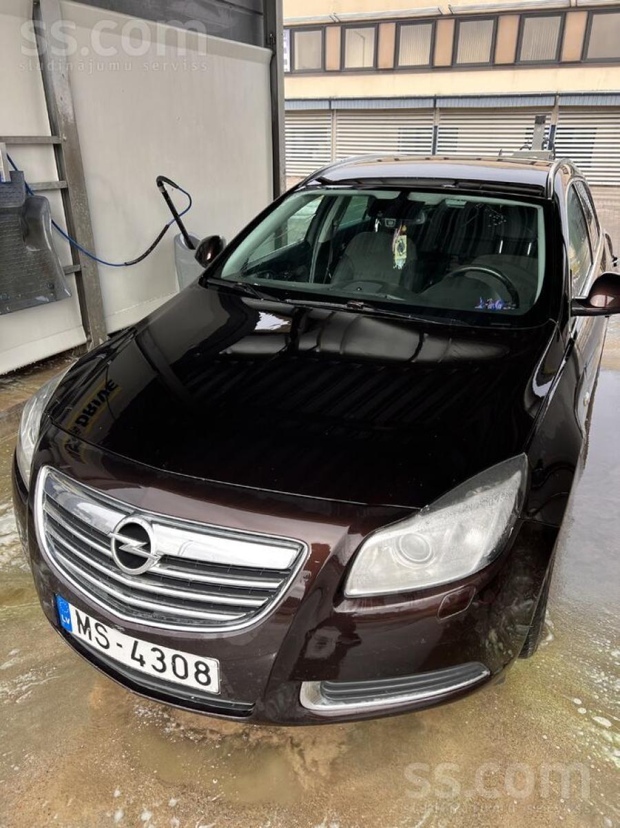 Brown Opel Insignia 2012 in Liepaja, with an engine capacity of 2.00 L and mileage of 340 thousand km for 3250 €, photo 3 on AUTOMOTO.COM.LV