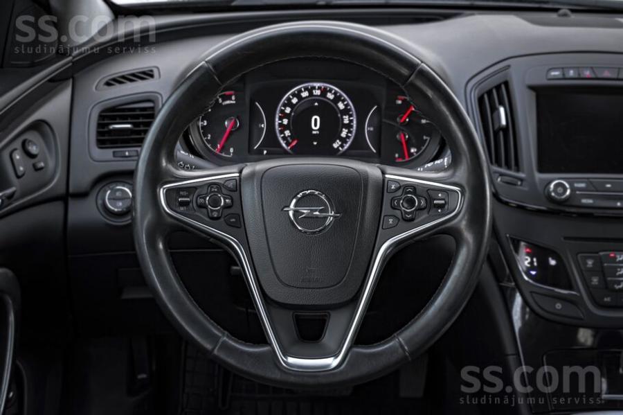 Brown Opel Insignia 2014 in Riga, with an engine capacity of 2.00 L and mileage of 270 thousand km for 7690 €, photo 22 on AUTOMOTO.COM.LV