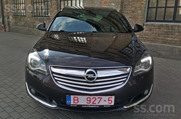 Brown Opel Insignia 2014 in Riga, with an engine capacity of 2.00 L and mileage of 0 thousand km for 4690 €, photo 3 on AUTOMOTO.COM.LV