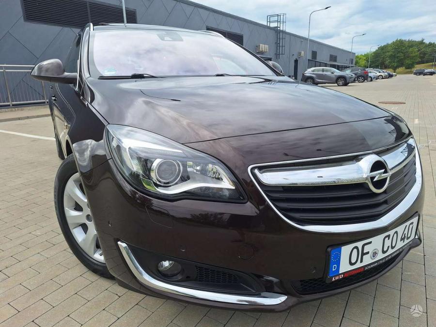 Brown Opel Insignia 2014 in Kaunas, with an engine capacity of 1.96 L and mileage of 292 thousand km for 4600 €, photo 4 on AUTOMOTO.COM.LV
