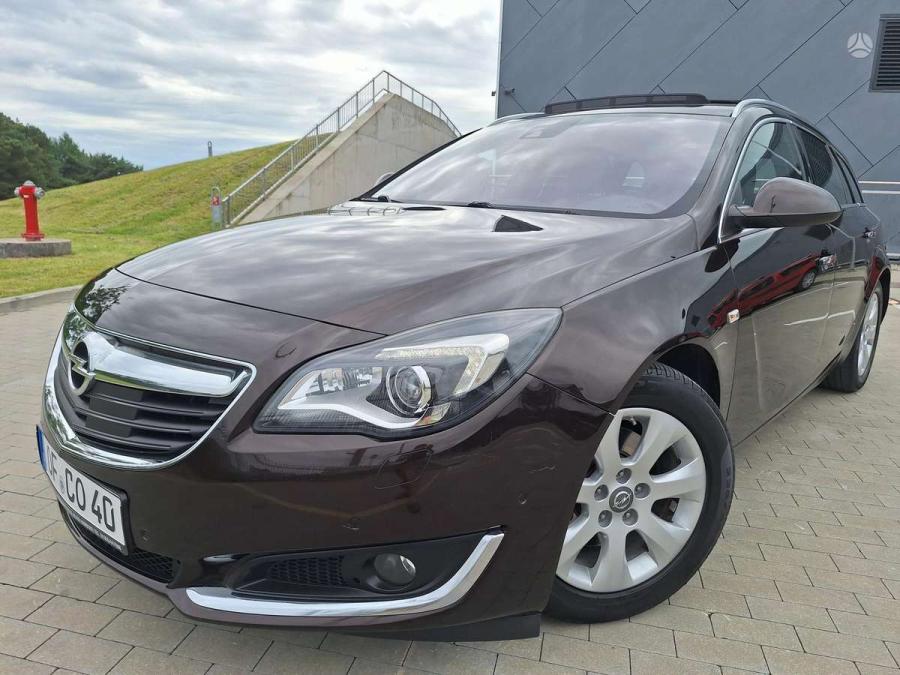 Brown Opel Insignia 2014 in Kaunas, with an engine capacity of 1.96 L and mileage of 292 thousand km for 4600 €, photo 12 on AUTOMOTO.COM.LV