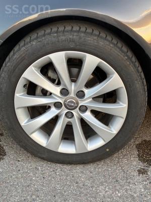 Brown Opel Insignia 2014 in Jekabpils, with an engine capacity of 2.00 L and mileage of 223 thousand km for 6200 €, photo 10 on AUTOMOTO.COM.LV