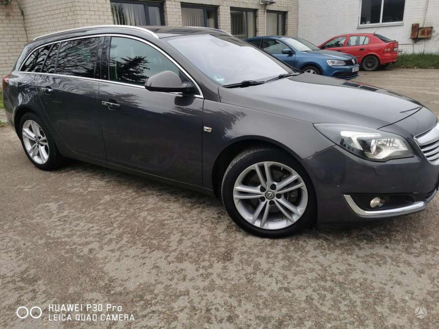 Brown Opel Insignia 2015 in Prienai, with an engine capacity of 1.96 L and mileage of 221 thousand km for 5799 €, photo 4 on AUTOMOTO.COM.LV