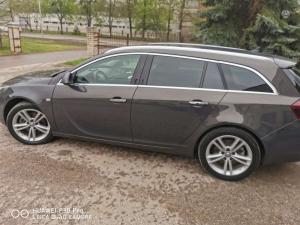 Brown Opel Insignia 2015 in Prienai, with an engine capacity of 1.96 L and mileage of 221 thousand km for 5799 €, photo 12 on AUTOMOTO.COM.LV