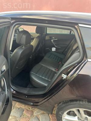 Brown Opel Insignia 2015 in Liepaja, with an engine capacity of 2.00 L and mileage of 292 thousand km for 4200 €, photo 9 on AUTOMOTO.COM.LV