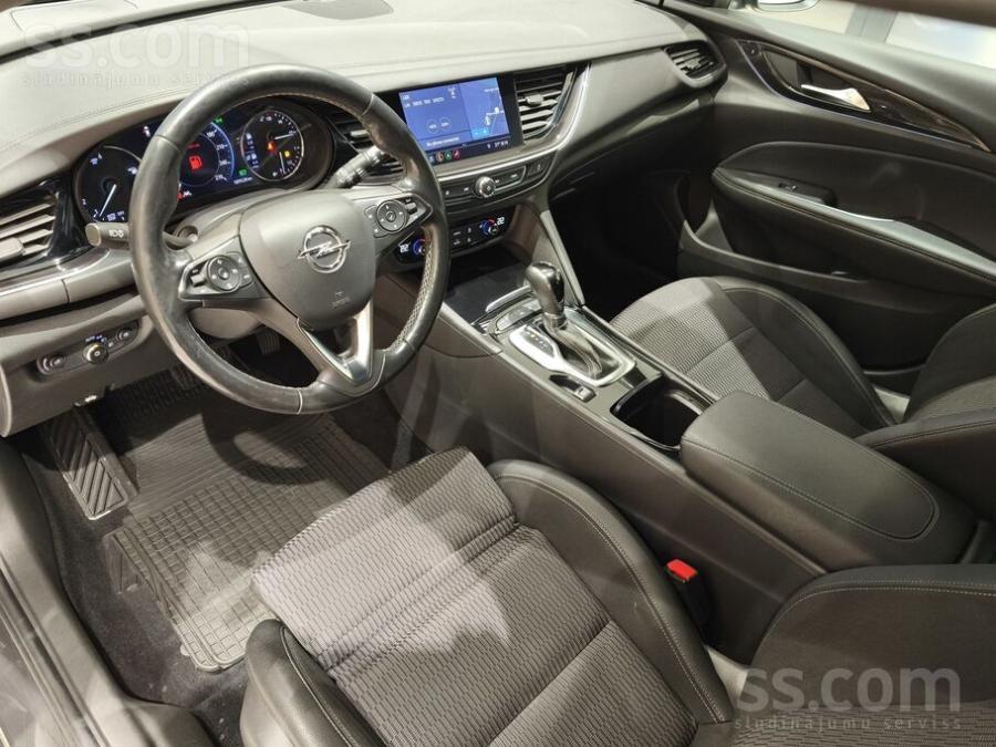 Brown Opel Insignia 2021 in Riga, with an engine capacity of 2.00 L and mileage of 190 thousand km for 12690 €, photo 9 on AUTOMOTO.COM.LV