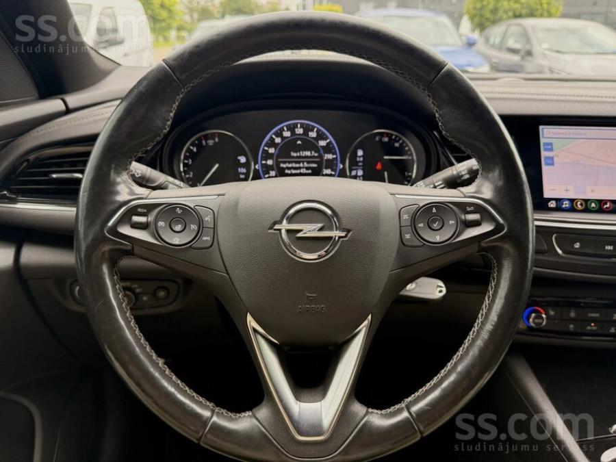 Brown Opel Insignia 2021 in Riga, with an engine capacity of 2.00 L and mileage of 190 thousand km for 11590 €, photo 11 on AUTOMOTO.COM.LV
