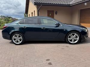 Green Opel Insignia 2014 in Utena, with an engine capacity of 1.96 L and mileage of 304 thousand km for 4600 €, photo 5 on AUTOMOTO.COM.LV