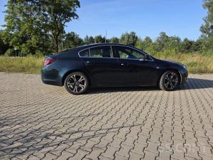 Green Opel Insignia 2015 in Riga, with an engine capacity of 2.00 L and mileage of 289 thousand km for 5300 €, photo 5 on AUTOMOTO.COM.LV