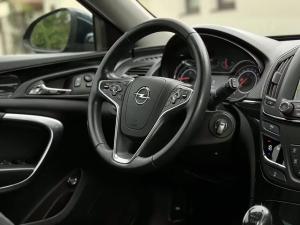 Green Opel Insignia 2008 in Jurmala, with an engine capacity of 2.00 L and mileage of 288 thousand km for 5590 €, photo 16 on AUTOMOTO.COM.LV