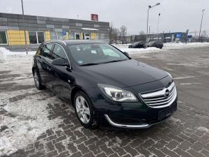 Zaļš Opel Insignia 2014 Kauņa, ar dzinēja tilpumu 1.96 L un nobraukumu 157 tūkst. km par 5990 €, foto  vietnē AUTOMOTO.COM.LV