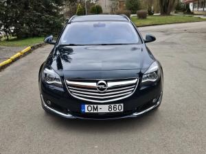 Green Opel Insignia 2014 in Jekabpils, with an engine capacity of 2.00 L and mileage of 222 thousand km for 6990 €, photo 4 on AUTOMOTO.COM.LV