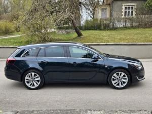 Green Opel Insignia 2014 in Jekabpils, with an engine capacity of 2.00 L and mileage of 222 thousand km for 6990 €, photo 6 on AUTOMOTO.COM.LV