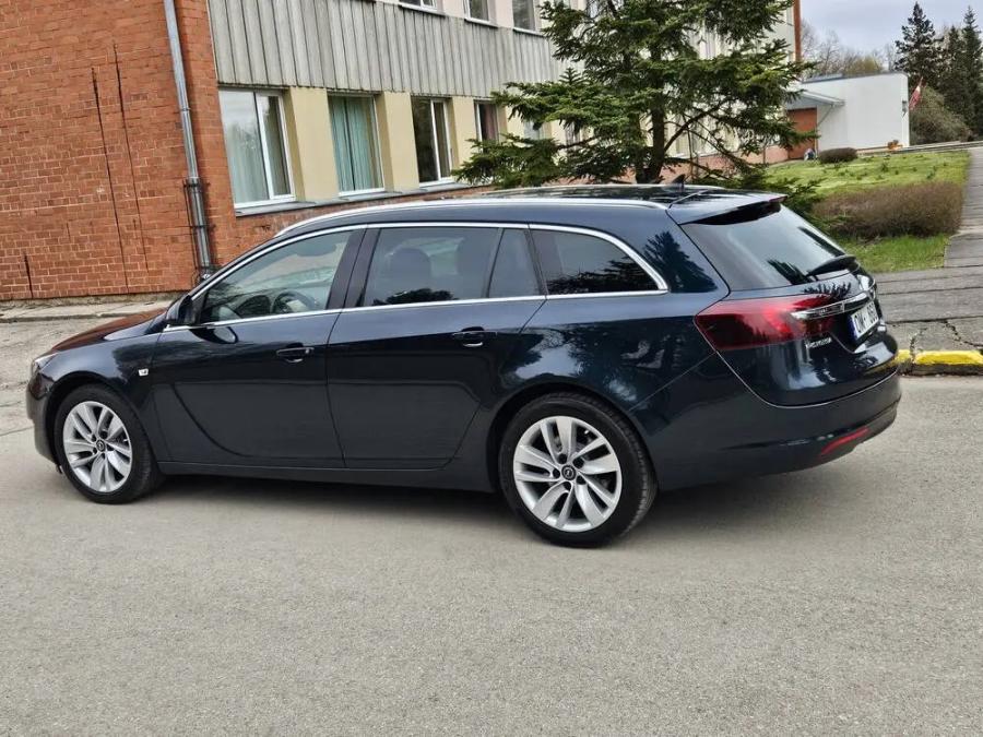 Green Opel Insignia 2014 in Jekabpils, with an engine capacity of 2.00 L and mileage of 222 thousand km for 6990 €, photo 11 on AUTOMOTO.COM.LV