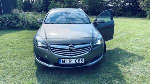 Zaļš Opel Insignia 2014 Panevēža, ar dzinēja tilpumu 1.96 L un nobraukumu 344 tūkst. km par 5700 €, foto  vietnē AUTOMOTO.COM.LV