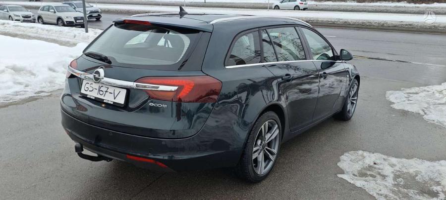 Green Opel Insignia 2015 in Kaunas, with an engine capacity of 1.96 L and mileage of 238 thousand km for 4950 €, photo 4 on AUTOMOTO.COM.LV