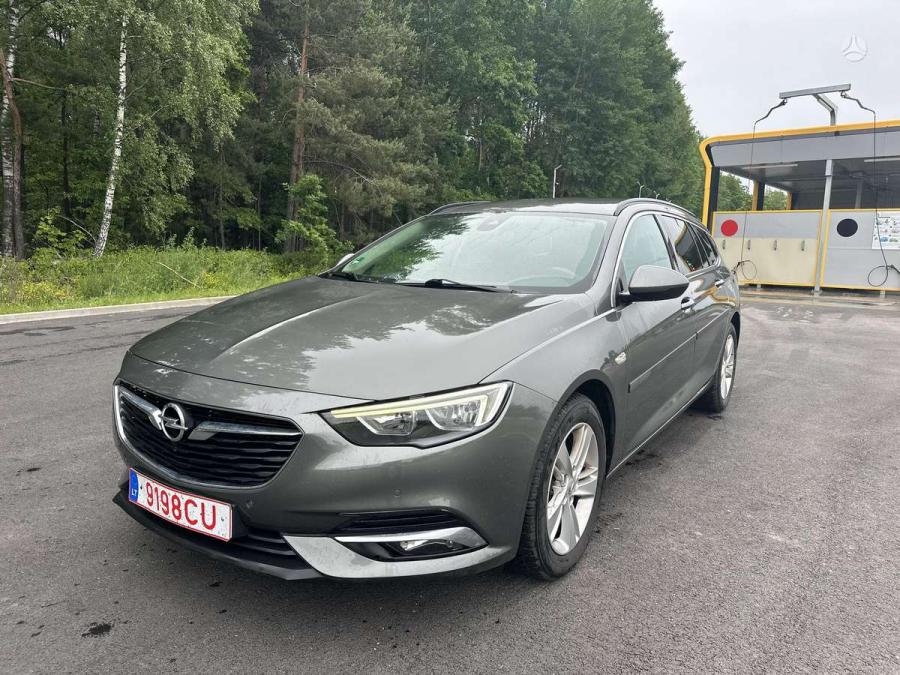 Green Opel Insignia 2017 in Kaunas, with an engine capacity of 1.96 L and mileage of 204 thousand km for 7700 €, photo 4 on AUTOMOTO.COM.LV