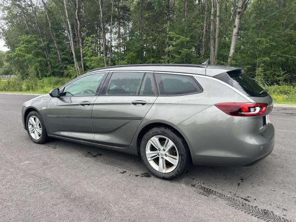 Green Opel Insignia 2017 in Kaunas, with an engine capacity of 1.96 L and mileage of 204 thousand km for 7700 €, photo 7 on AUTOMOTO.COM.LV