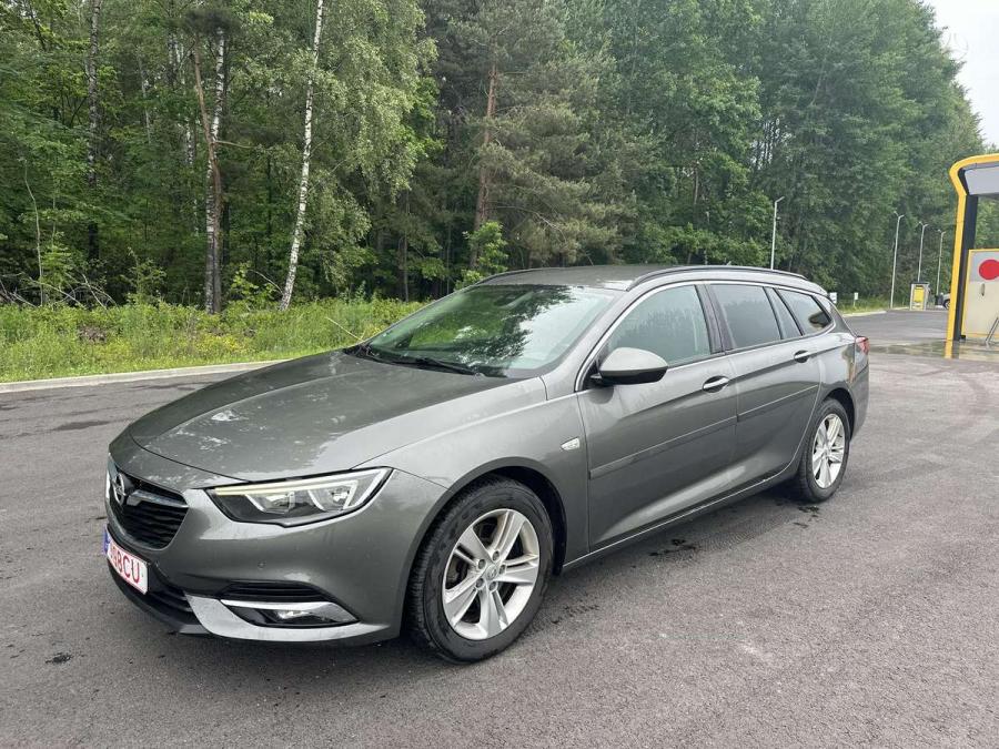 Green Opel Insignia 2017 in Kaunas, with an engine capacity of 1.96 L and mileage of 204 thousand km for 7700 €, photo 9 on AUTOMOTO.COM.LV