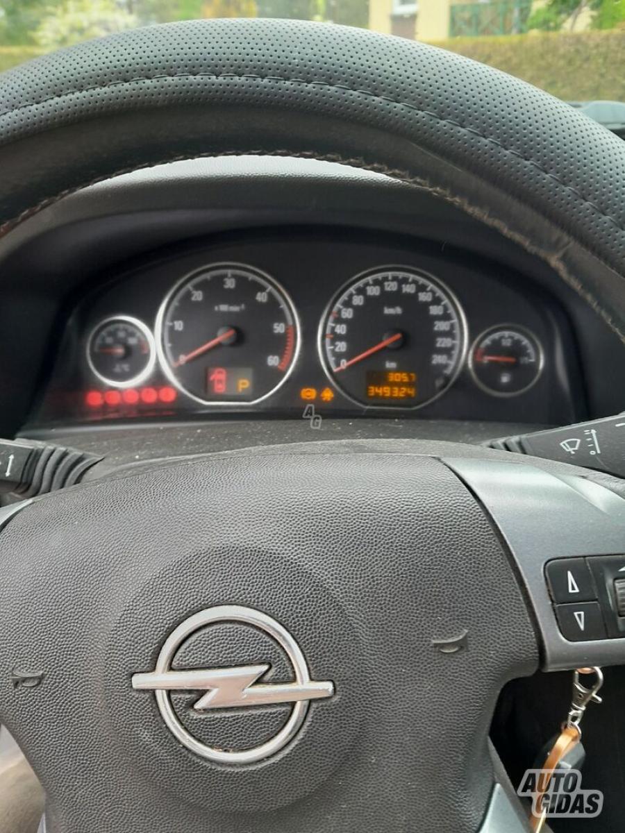 Pelēks Opel Insignia 2005 Biržai, ar dzinēja tilpumu 1.90 L un nobraukumu 349 tūkst. km par 1000 €, foto 5 vietnē AUTOMOTO.COM.LV