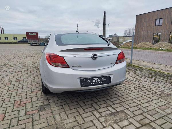 Grey Opel Insignia 2009 in Silute, with an engine capacity of 1.96 L and mileage of 240 thousand km for 2850 €, photo 3 on AUTOMOTO.COM.LV