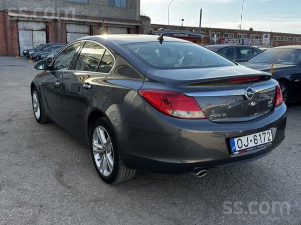 Grey Opel Insignia 2009 in Daugavpils, with an engine capacity of 2.00 L and mileage of 0 thousand km for 4590 €, photo 4 on AUTOMOTO.COM.LV